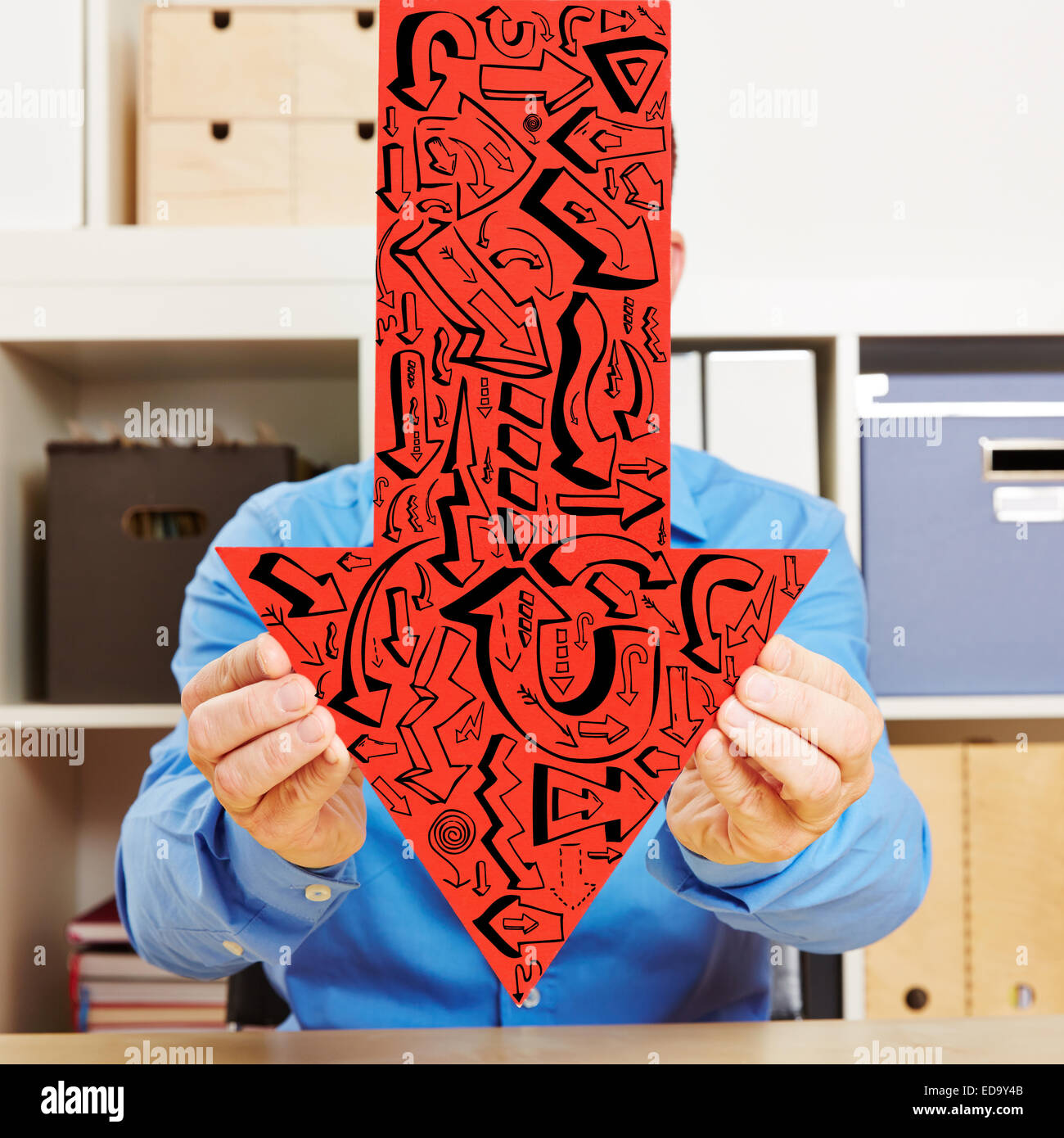 Many arrows as strategy concept on big red arrow Stock Photo - Alamy