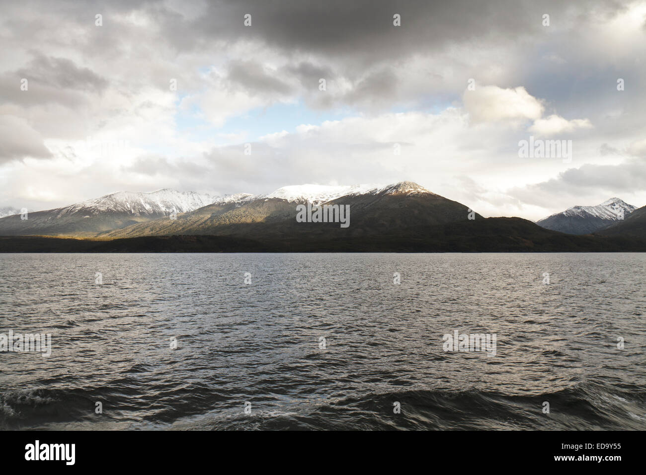 Looking across the Beagle Channel at sunset to Hoste Island, one of the ...