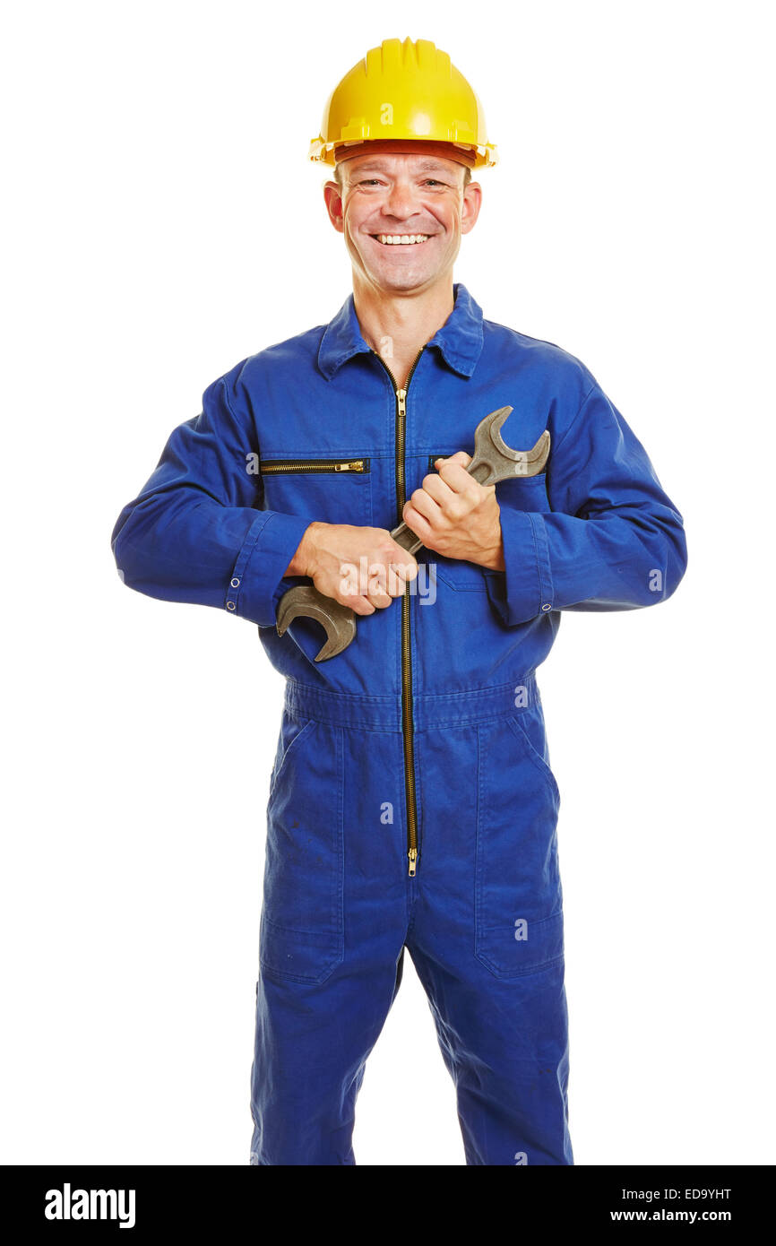 Smiling construction worker in boiler suit with safety helmet and jaw ...
