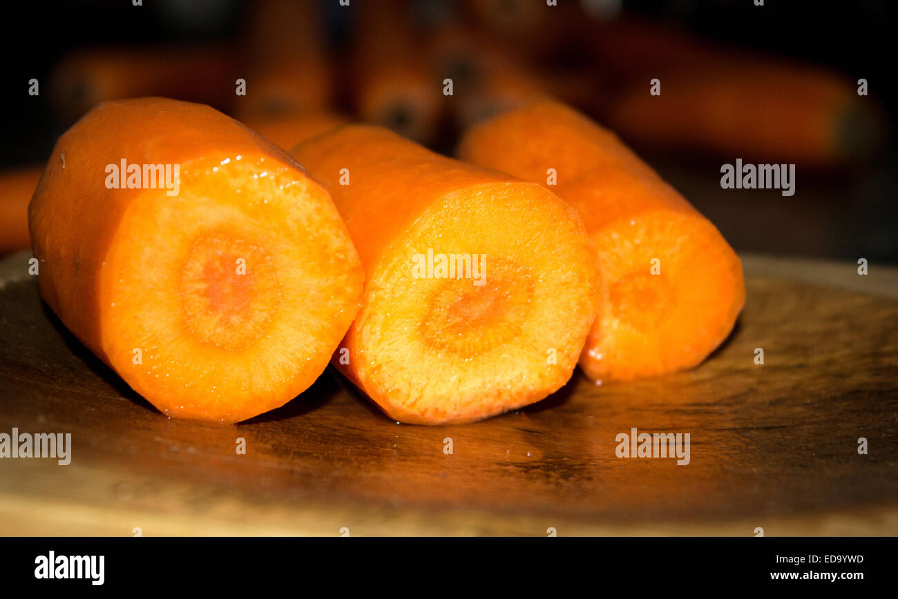Cross section of carrots that have had their ends chopped off and are ...