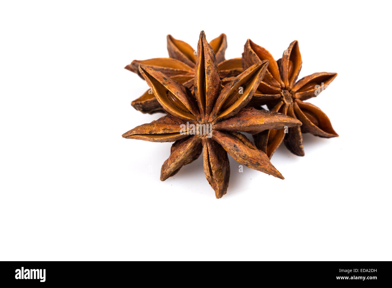 Stars of anise isolated on white background Stock Photo - Alamy