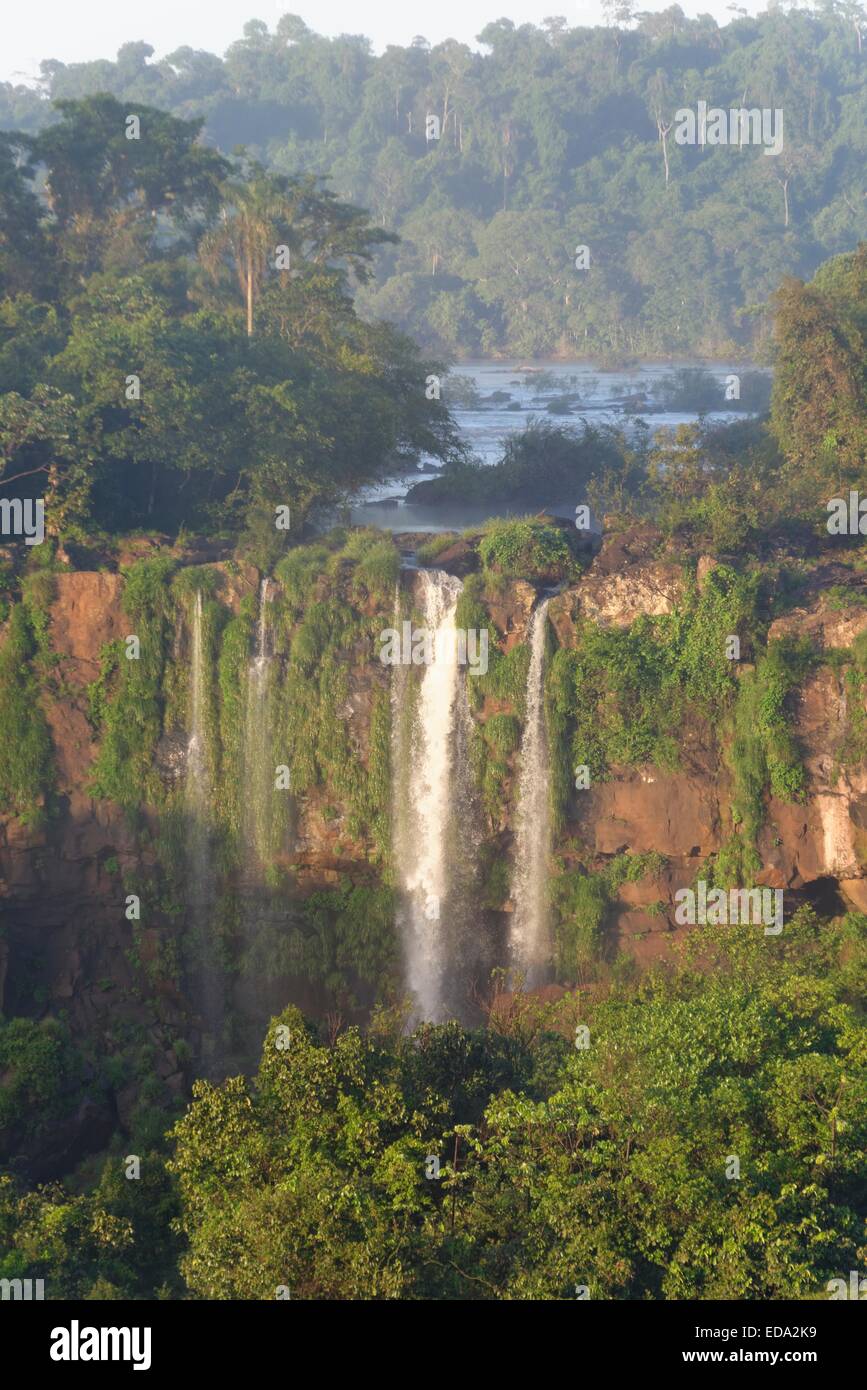 Water pouring over the mighty Iguacu waterfalls in Brazil. IGUAÇÚ Foz ...