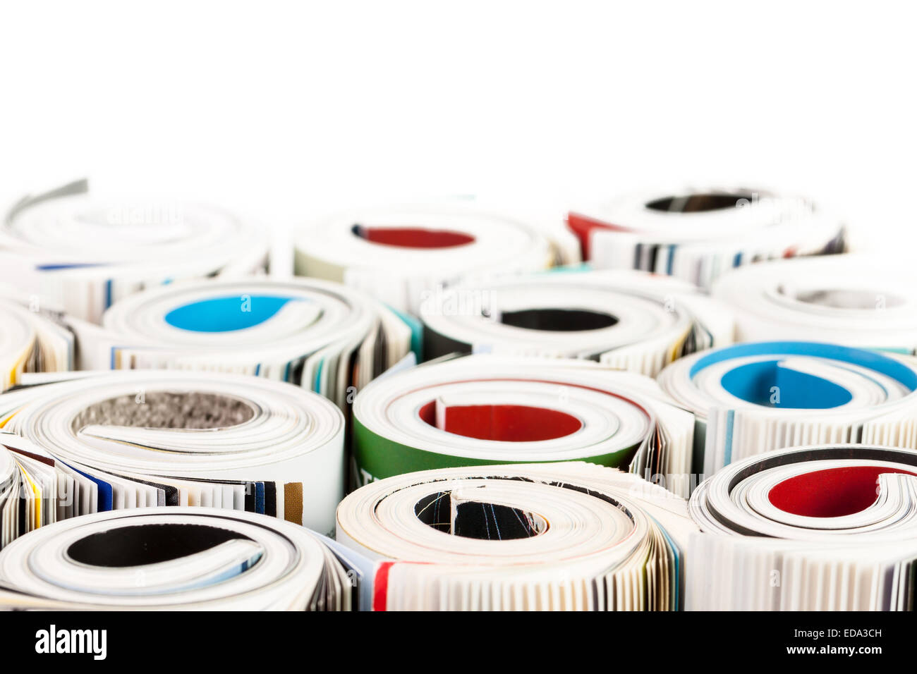 Pile of open magazines isolated on white background hi-res stock ...