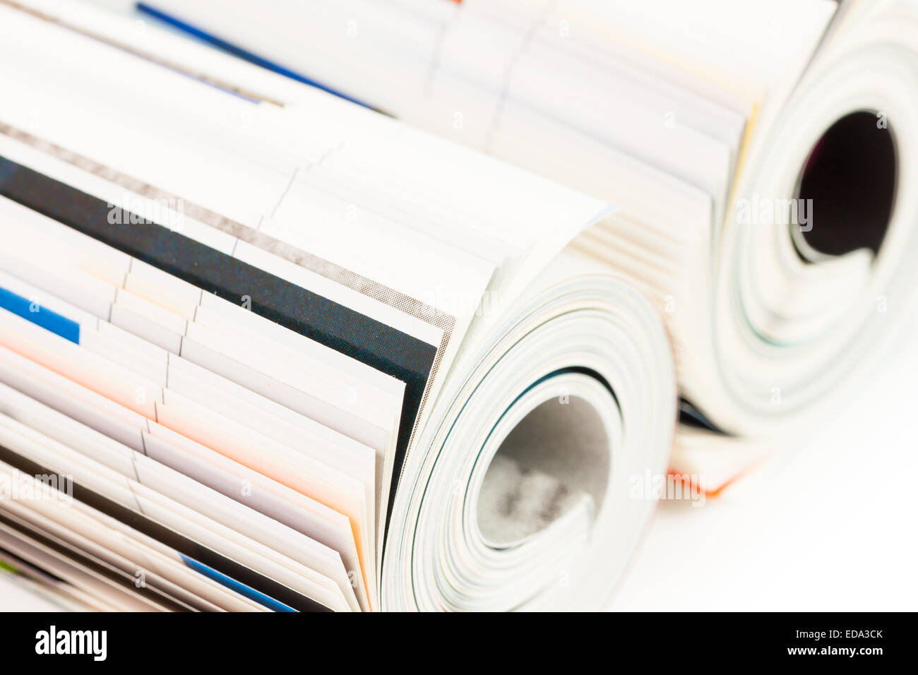 Rolled up magazine hi-res stock photography and images - Alamy