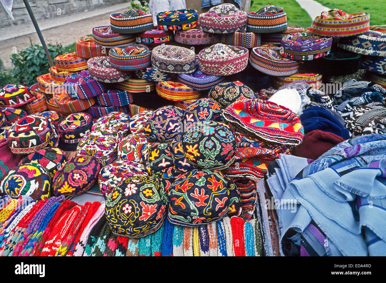 Very colorful knit caps and woven Turkish hats displayed at an outdoor ...