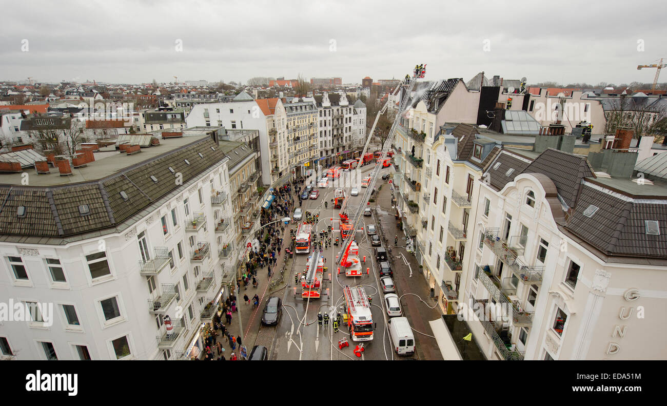 Hamburg, Germany. 3rd Jan, 2015. Firefighters extinguish a fire in a ...