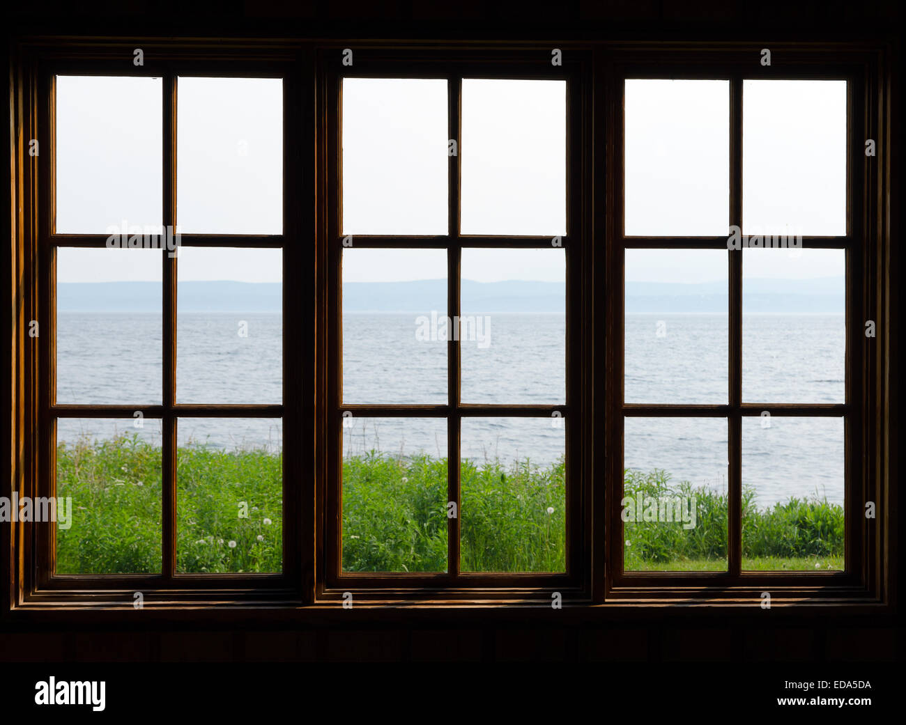 Sea view through window in sunny day Stock Photo - Alamy