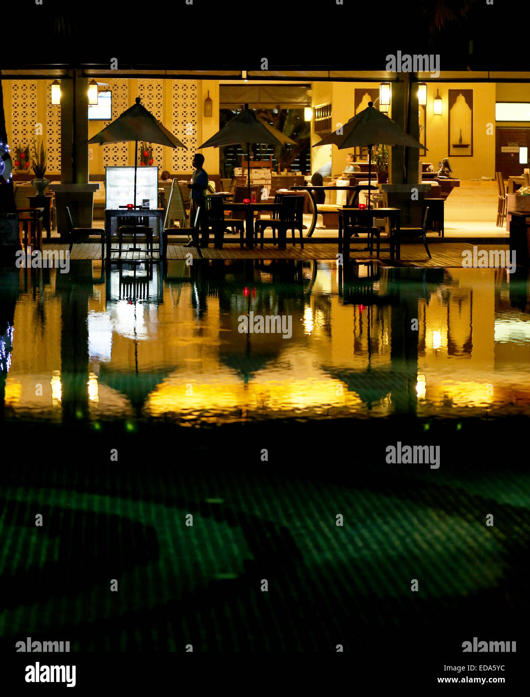 Beautiful Thai night restaurant next to the pool Stock Photo - Alamy