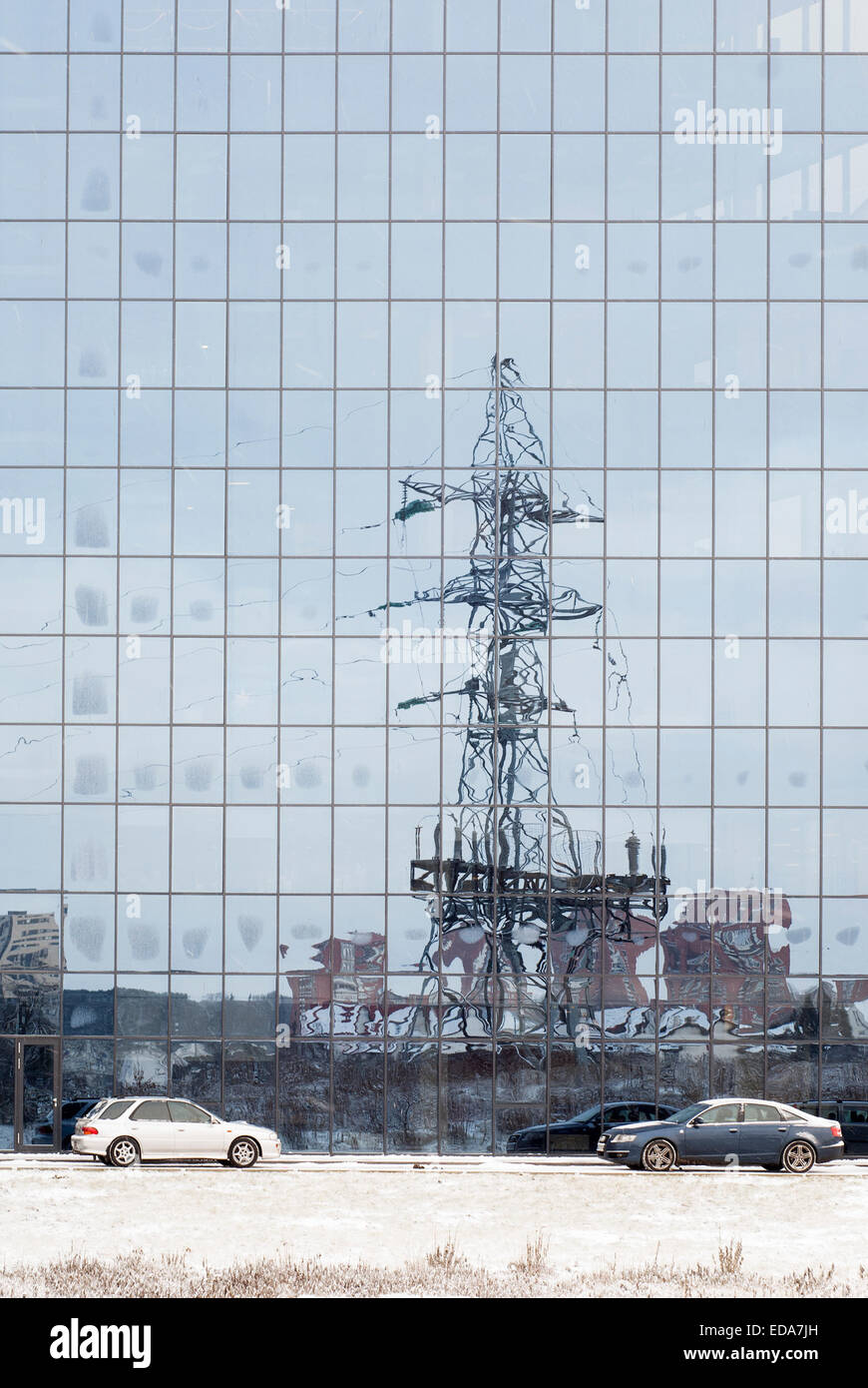 electric pole reflected in windows of office building Stock Photo - Alamy