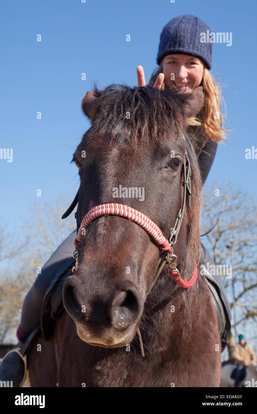 Woman riding pony hi-res stock photography and images - Alamy
