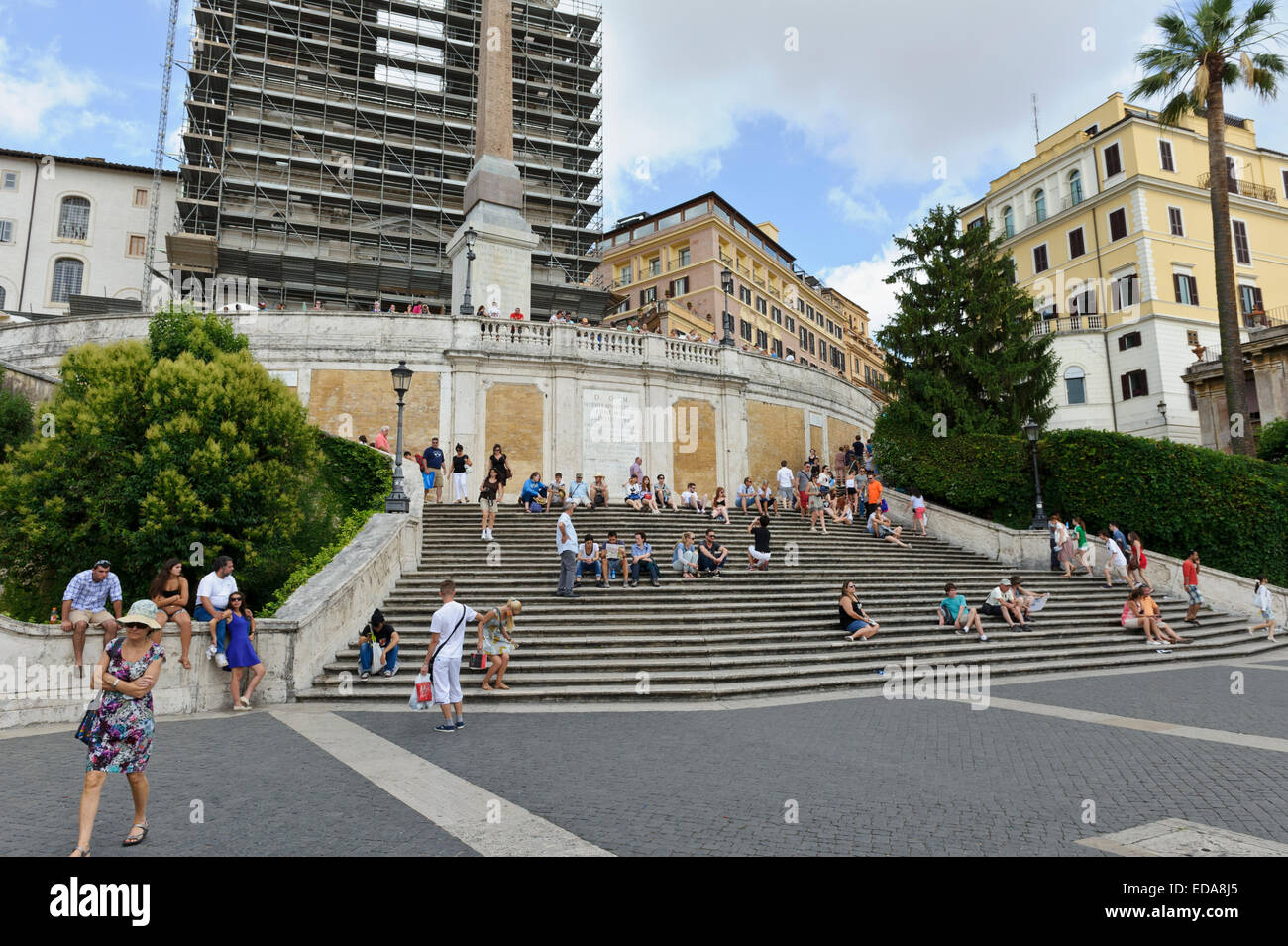Crowd sitting on the 128 Spanish Steps which are the longest and widest ...