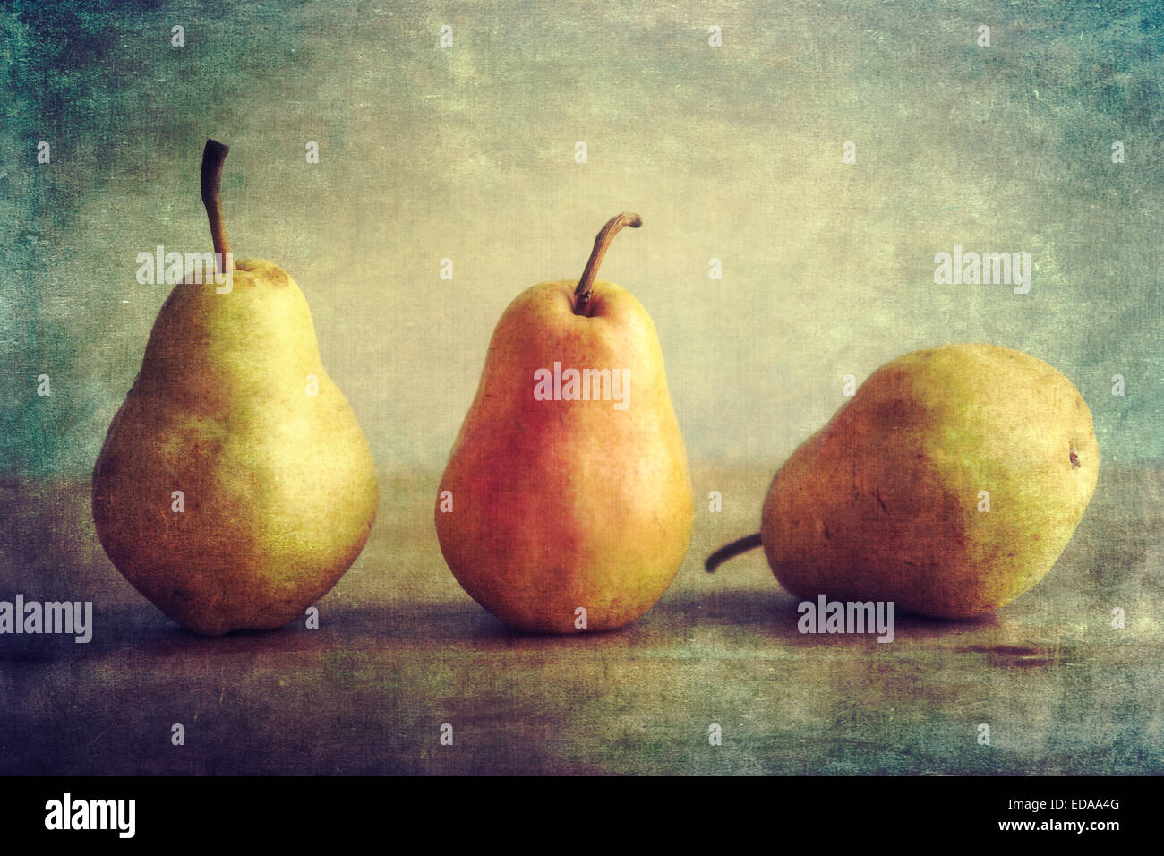 Still life with three pears Stock Photo - Alamy