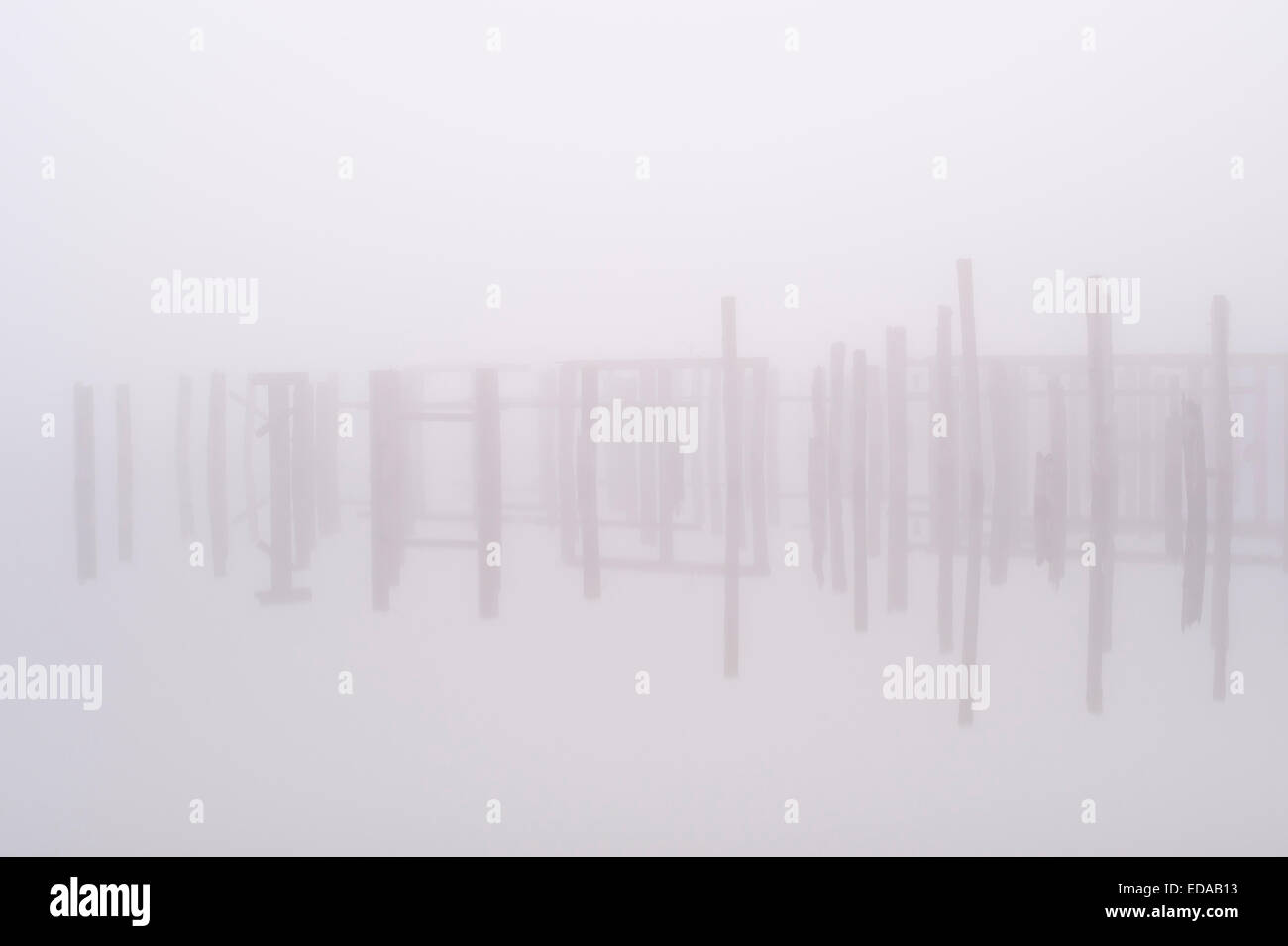 Fog with pilings Stock Photo - Alamy