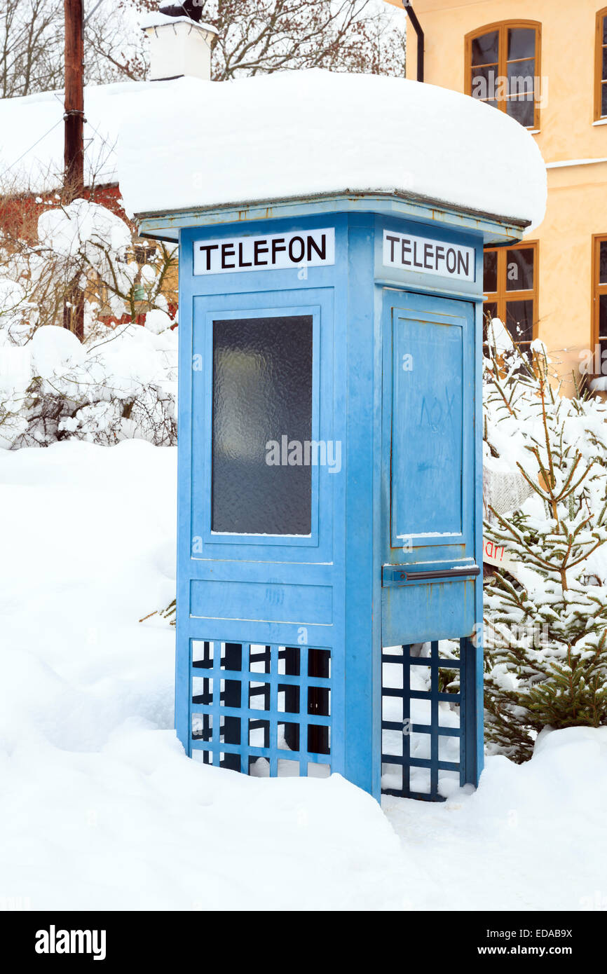 Blue Telephone Booth with snow in Stockholm Sweden Stock Photo - Alamy