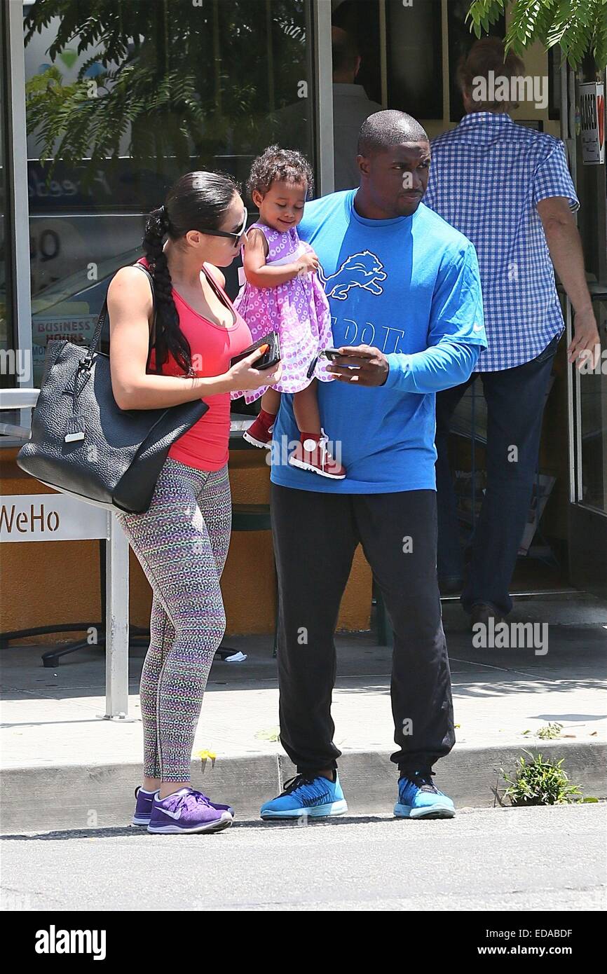 Reggie Bush with his wife Lilit Avagyan and baby daughter Briseis leave ...