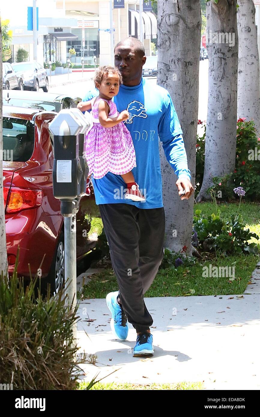 Reggie Bush with his wife Lilit Avagyan and baby daughter Briseis leave ...