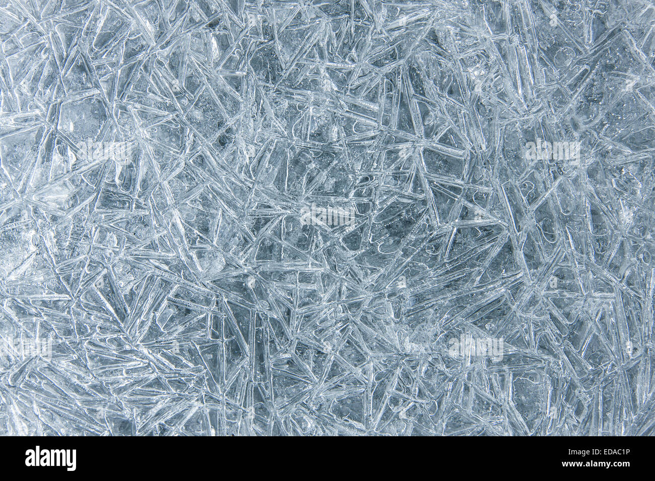 Frozen surface background with ice pattern Stock Photo - Alamy