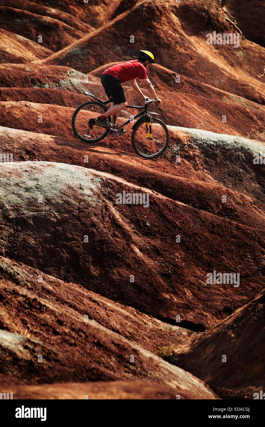 Asian man mountain biking in hi-res stock photography and images - Alamy