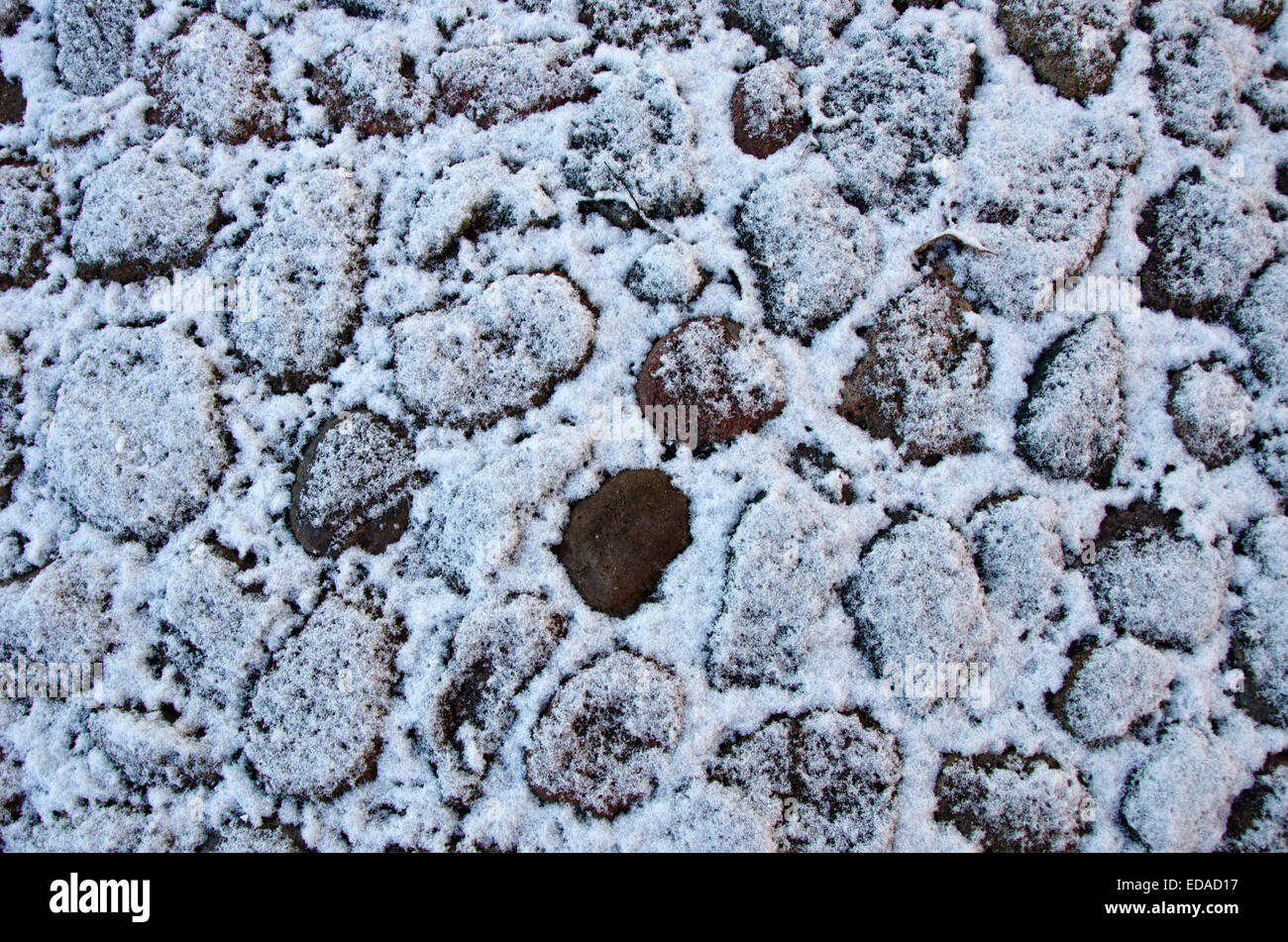 winter time cobblestone pavement background with fresh wet snow Stock ...