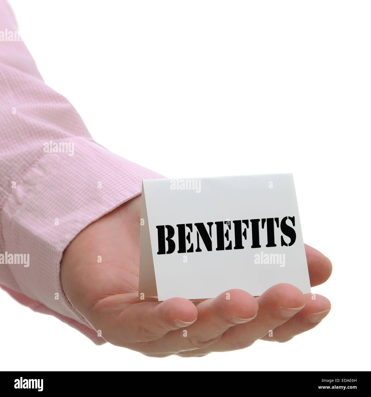 Business man holding benefits sign on hand Stock Photo - Alamy