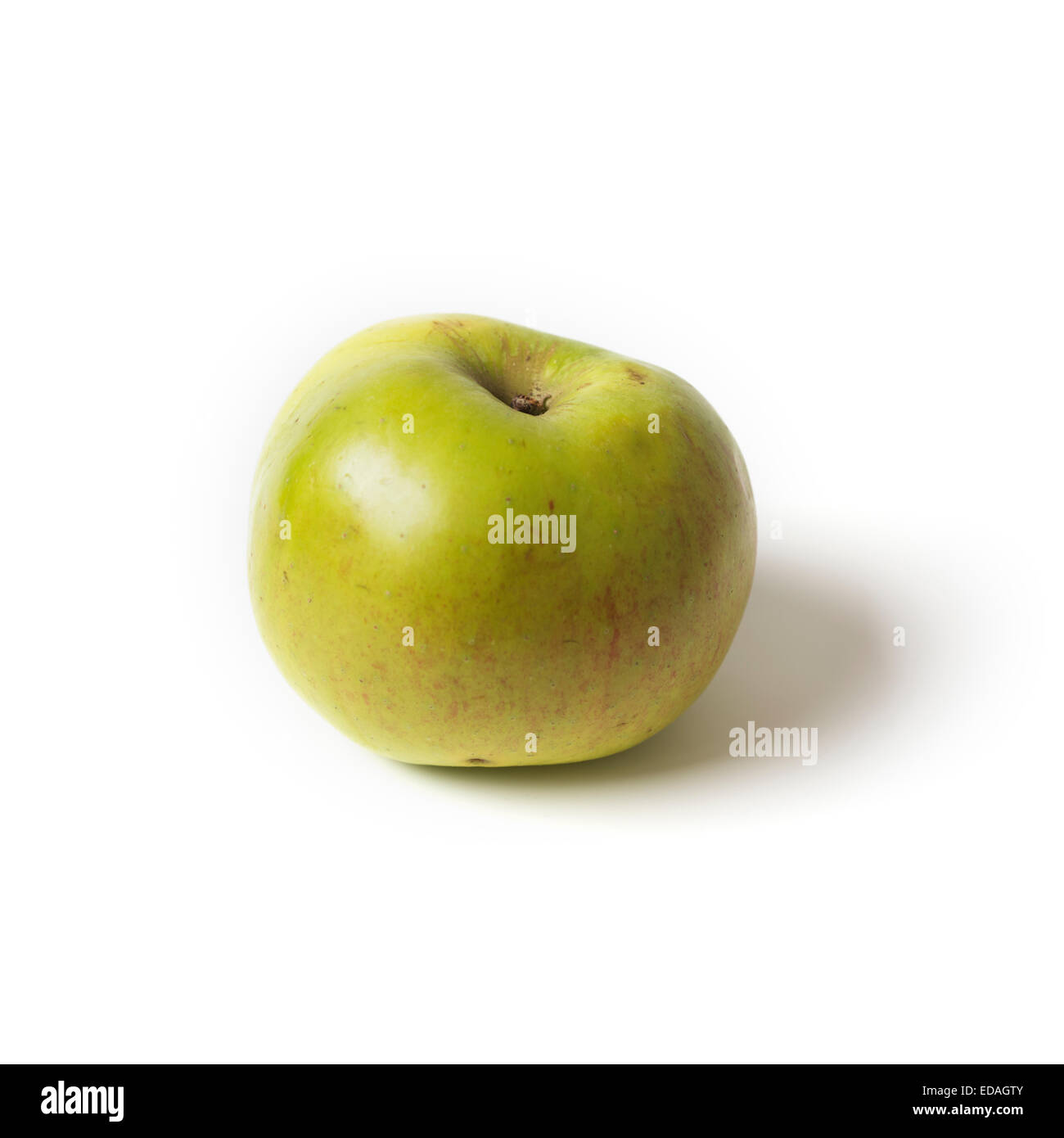 Bramley apple on white background Stock Photo - Alamy