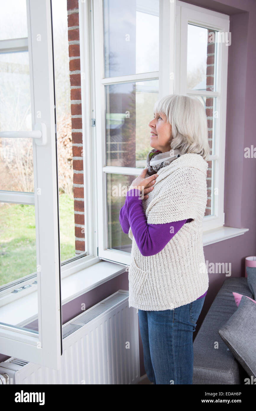 Female window breathe hi-res stock photography and images - Alamy