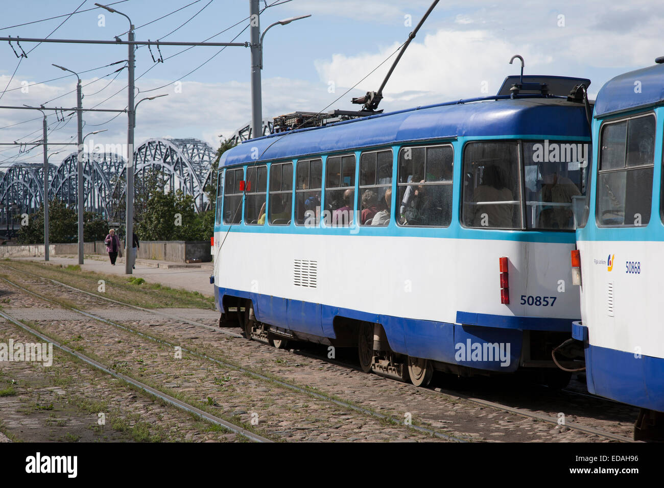 Tram in Riga Centre with Railway Bridge in Background; Lativa Stock ...