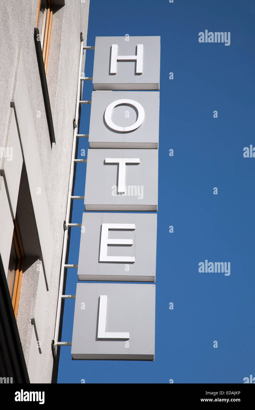 Hotel Sign against Building Facade Stock Photo - Alamy