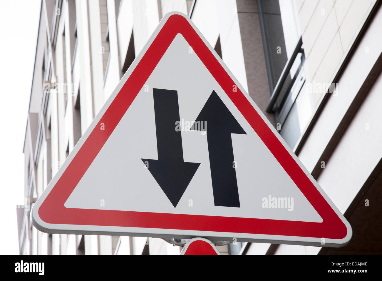 Double Arrow Traffic Sign Stock Photo - Alamy