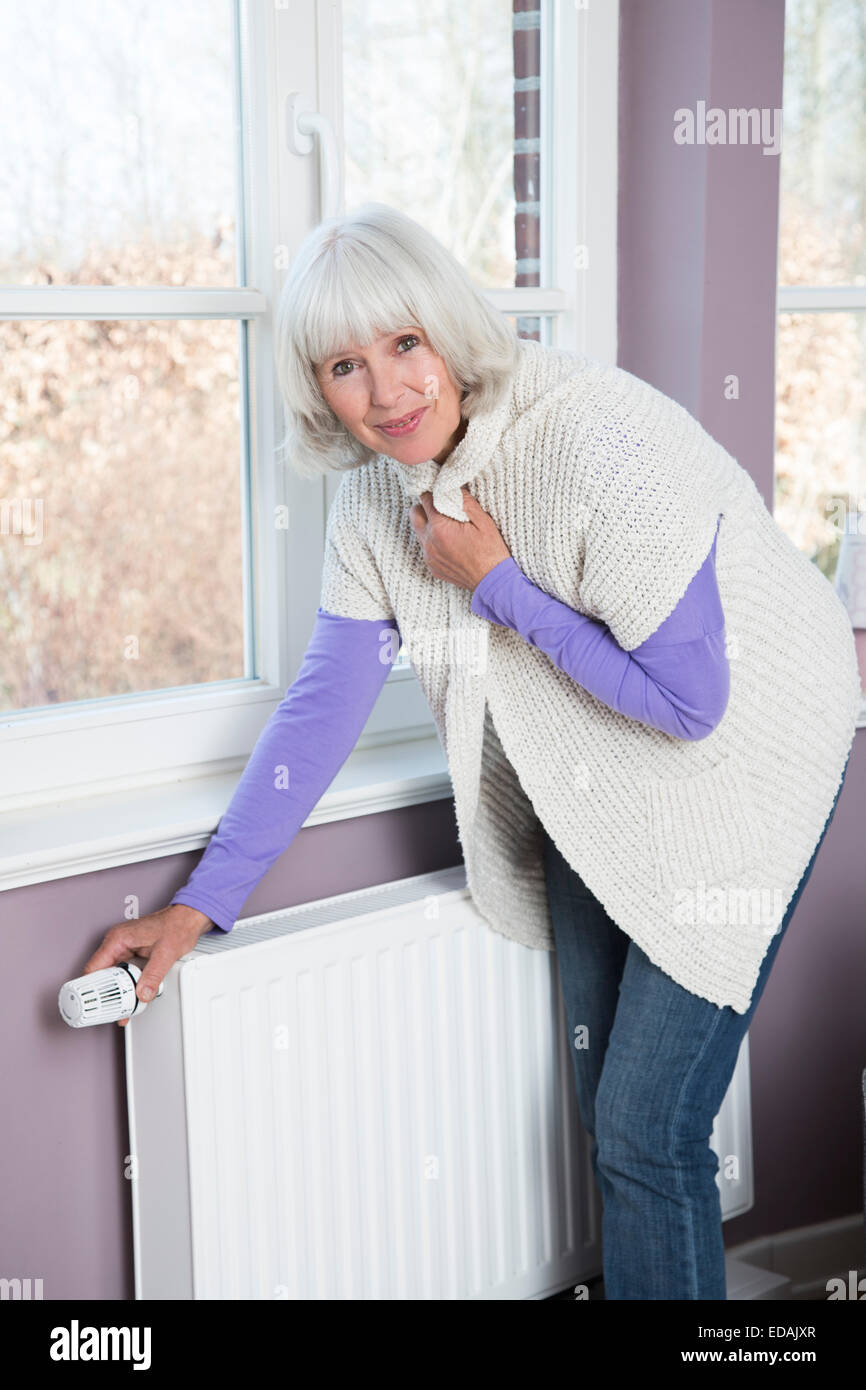 Turning off the heating hi-res stock photography and images - Alamy