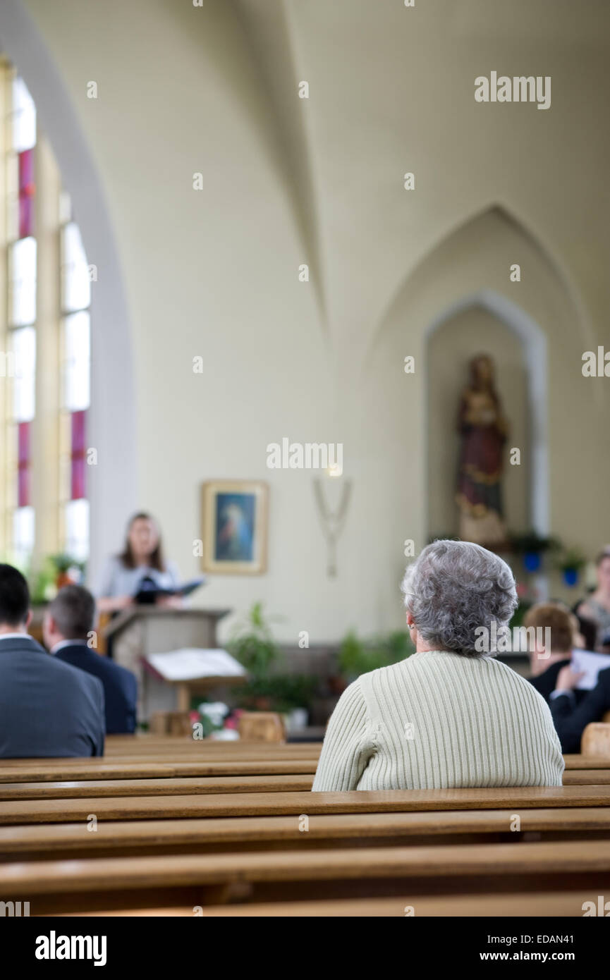 Sitting in church hi-res stock photography and images - Alamy
