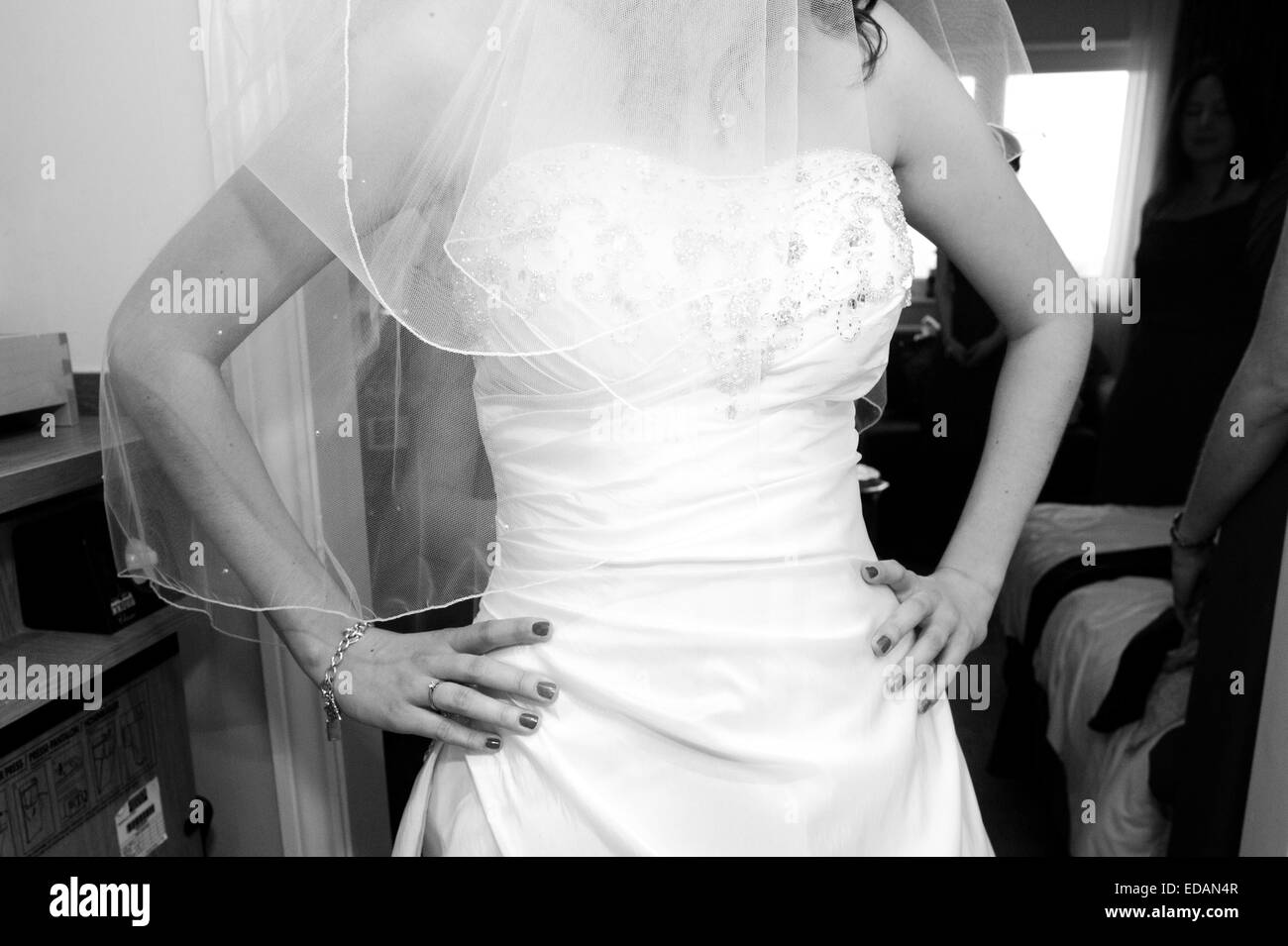 Standing on dress Black and White Stock Photos & Images - Alamy