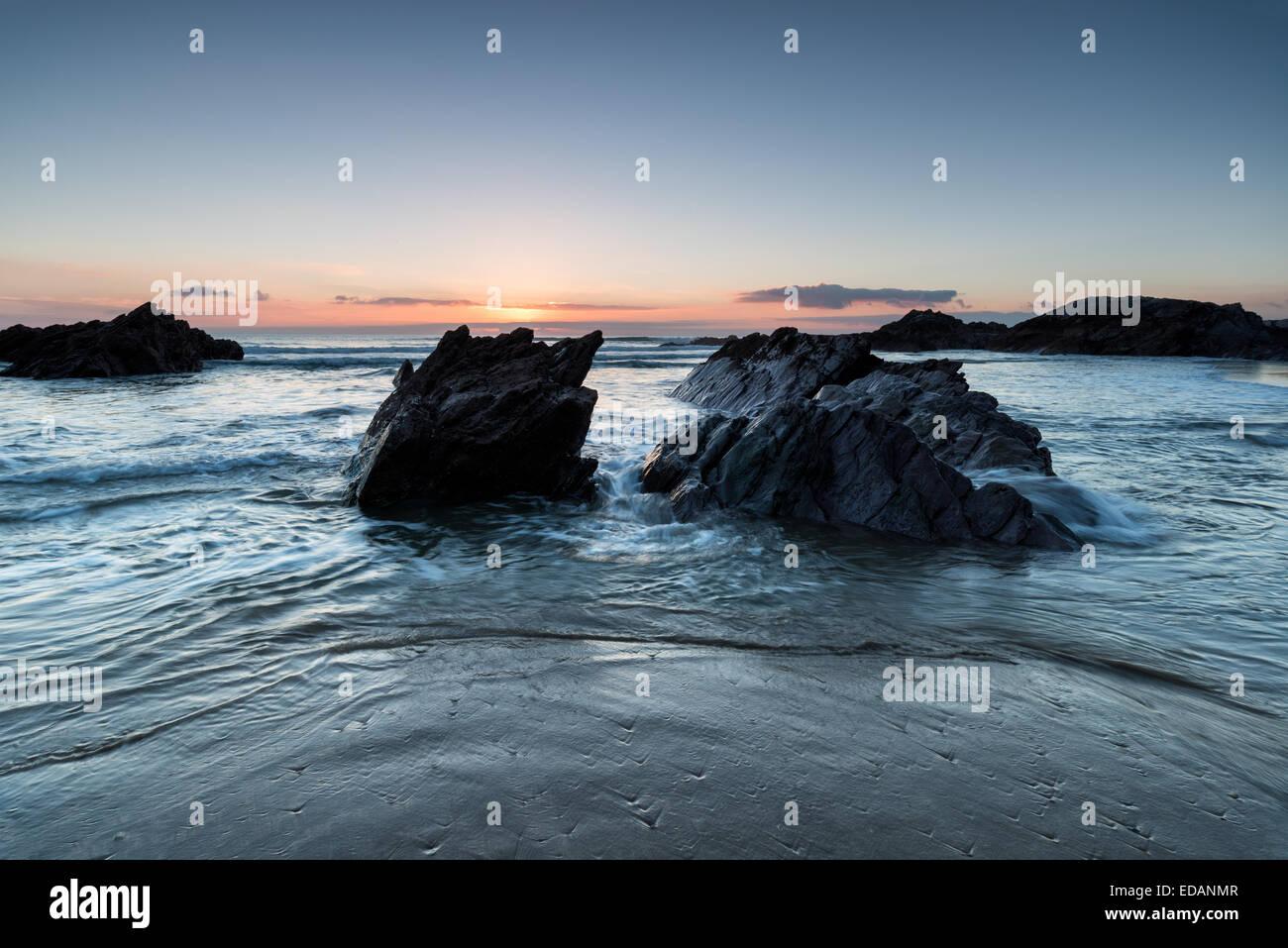 Sunset at Sharrow beach on the south coast of Cornwall Stock Photo - Alamy