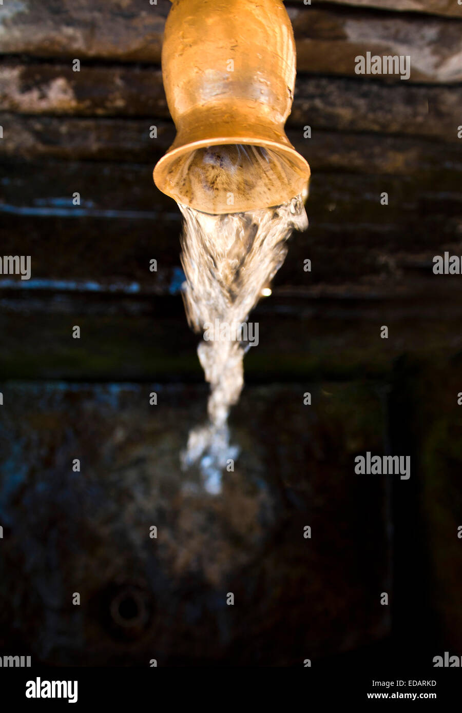 Water fountain with fresh water pouring Stock Photo - Alamy