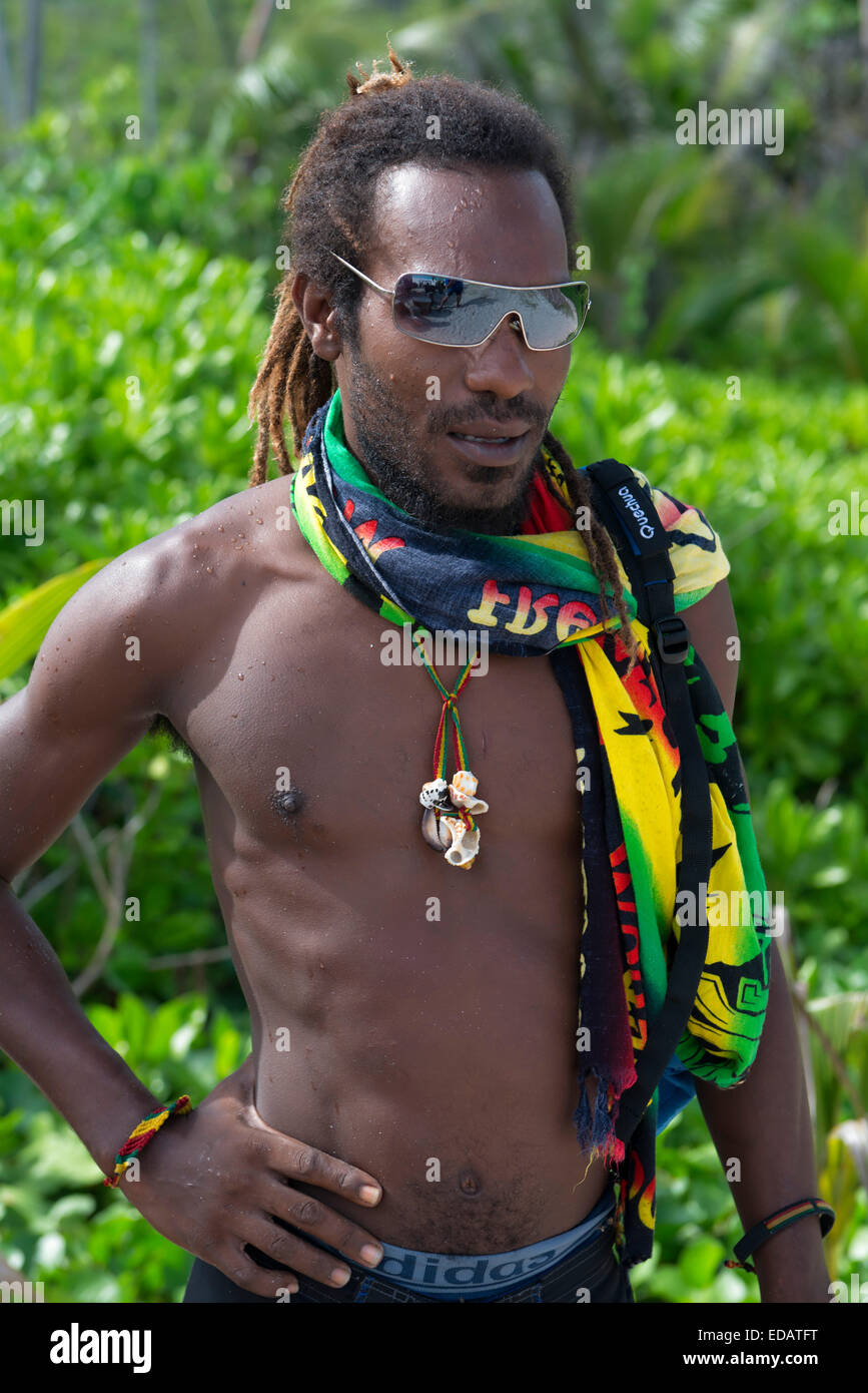 Beach Boy at Grand Anse Beach in La Digue, Seychelles Stock Photo - Alamy