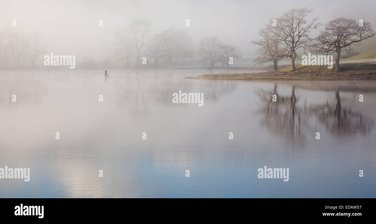 Fishermen on the misty waters of Esthwaite Water, near Hawkshead, Lake ...