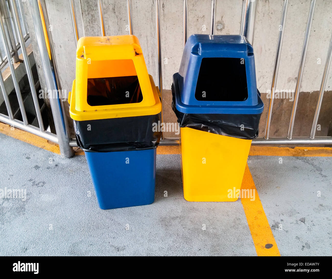 Twin plastic trash on the public bridge Stock Photo - Alamy