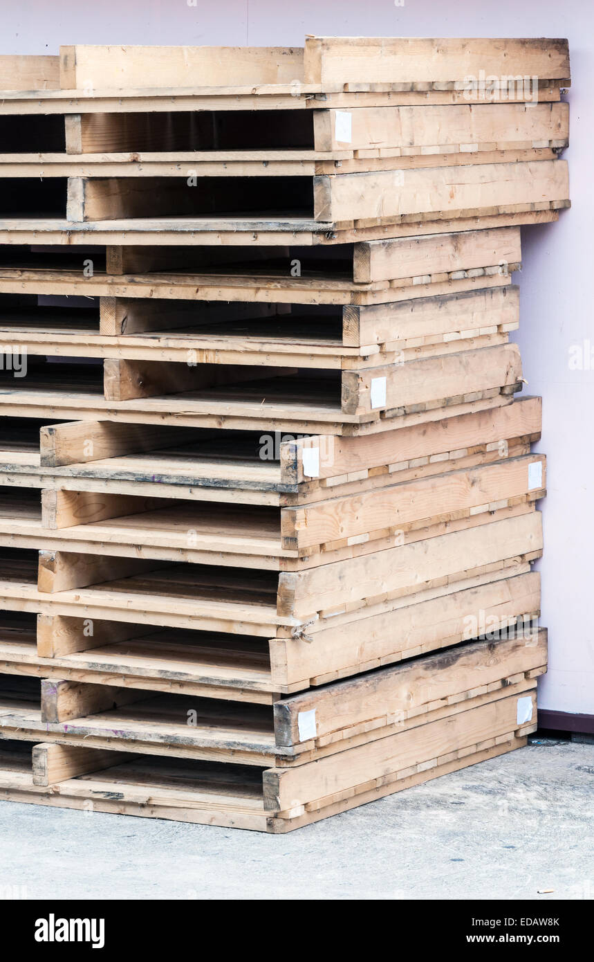 Wooden pallet is stacking near the warehouse wall Stock Photo - Alamy