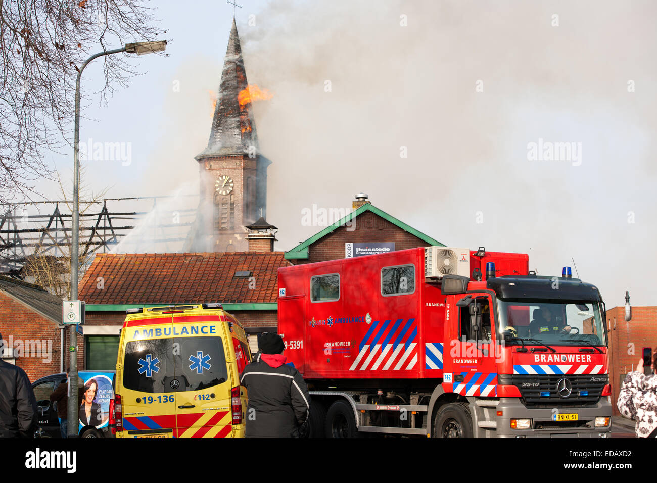 Various emergency personnel are present during a major fire in the ...