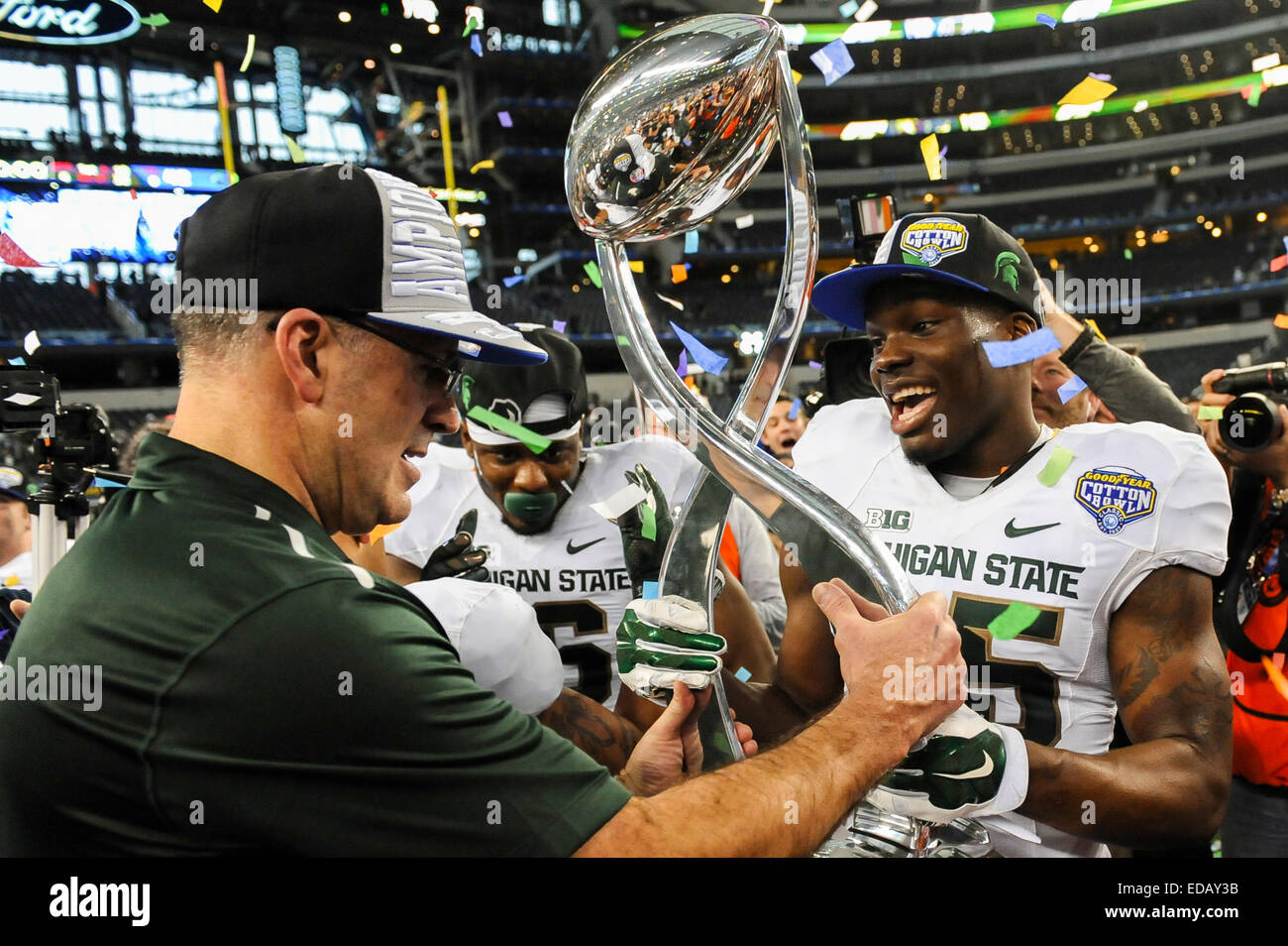 With Michigan State receiver Aaron Burbridge looking on, receiver Keith ...