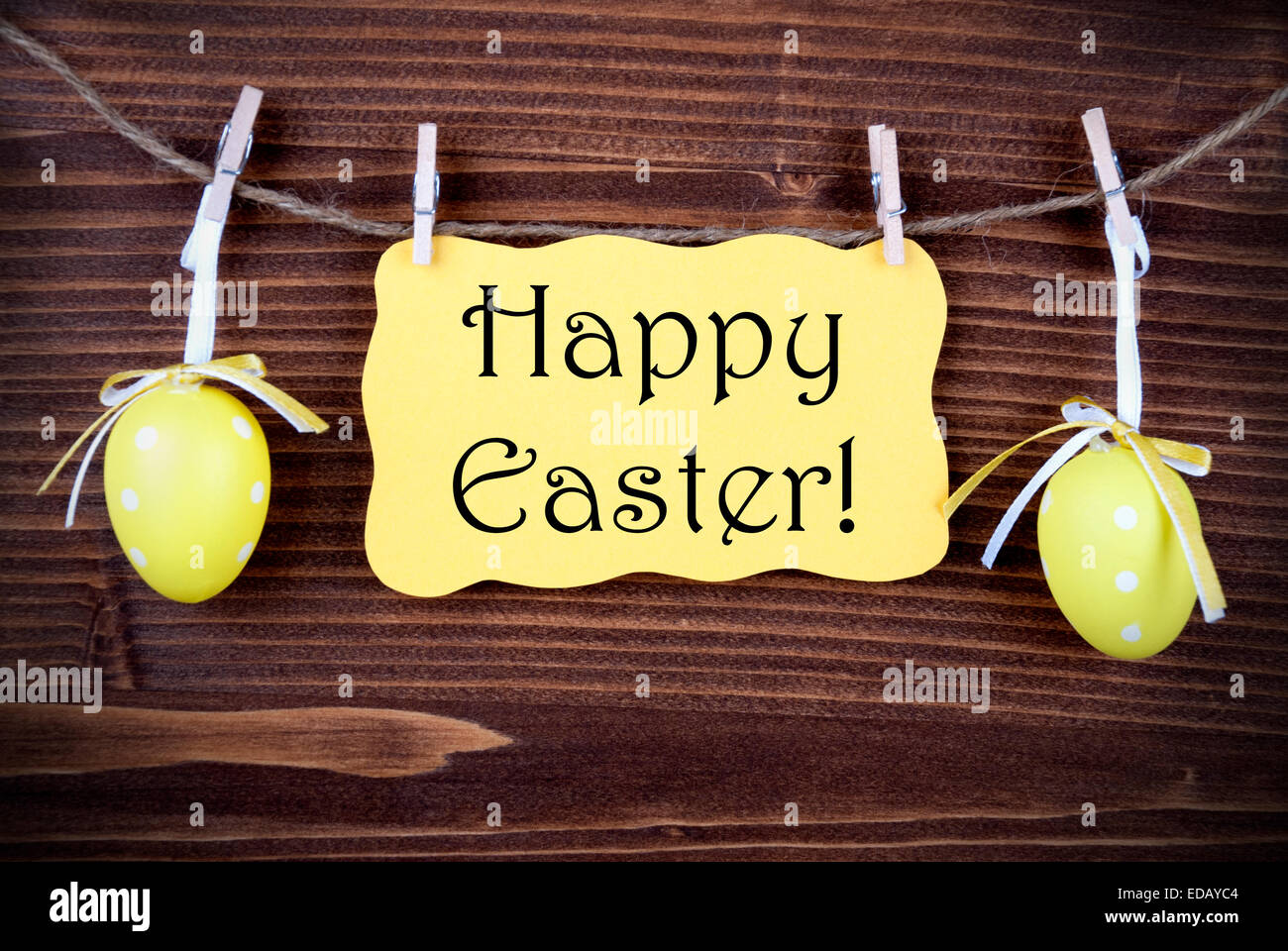 Yellow Easter Label With Happy Easter Hanging On A Line With Two Yellow ...