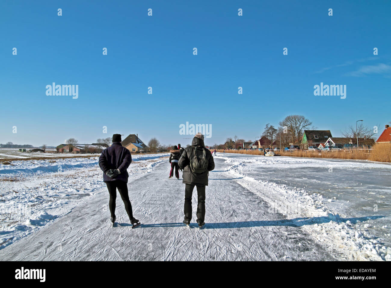 Ice skating in the countryside from the Netherlands Stock Photo - Alamy