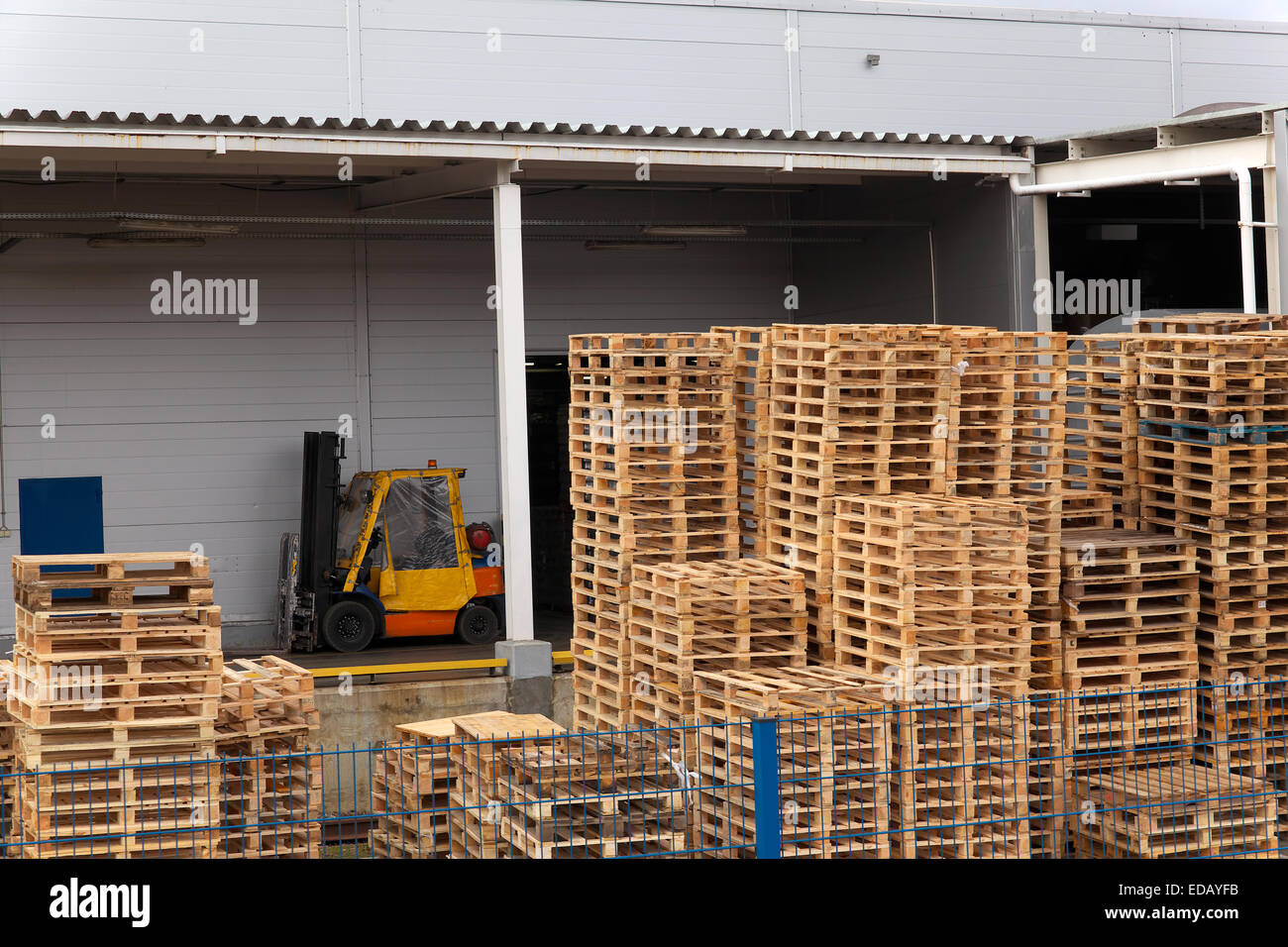 Warehouse yard with the forklift on the ramp Stock Photo - Alamy