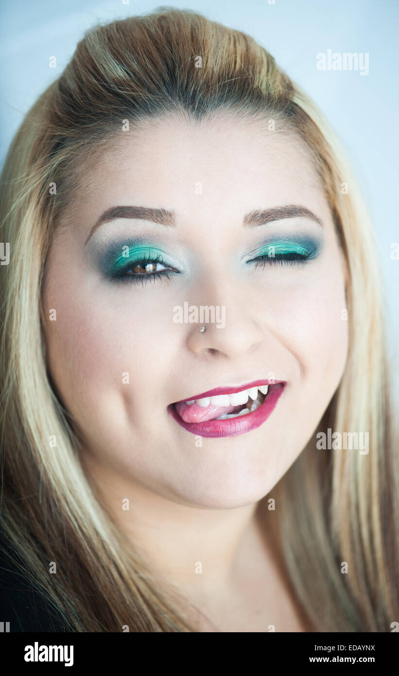 young girl with a cheerful facial expressions Stock Photo - Alamy