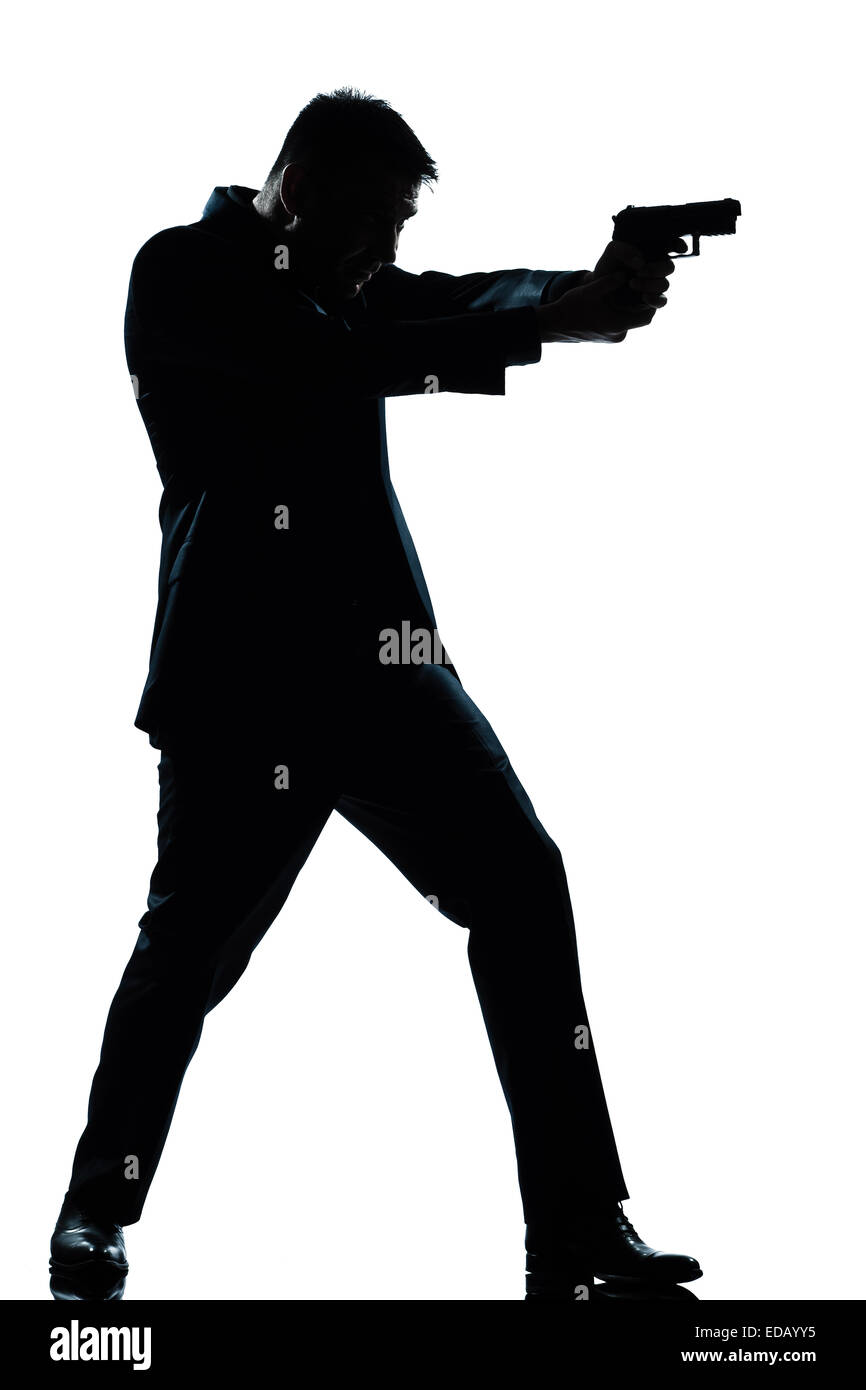 Man with gun in profile High Resolution Stock Photography and Images ...