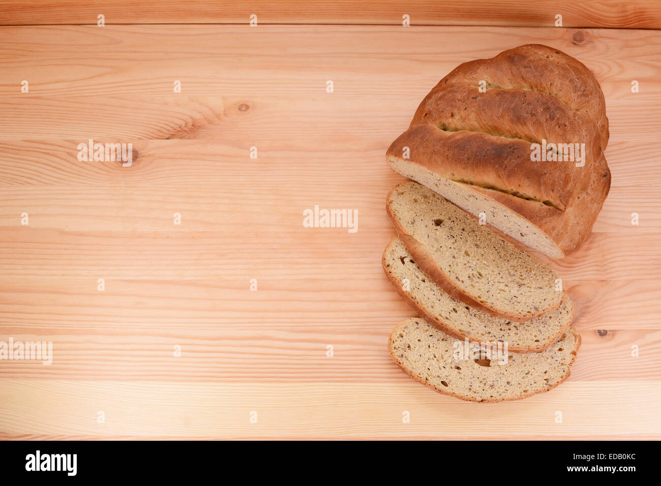 Fresh bread and cut slices border copy space on a wooden table Stock ...