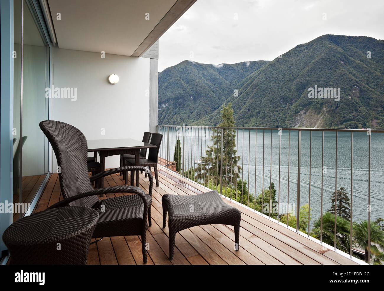 Modern house, balcony overlooking the lake Stock Photo - Alamy