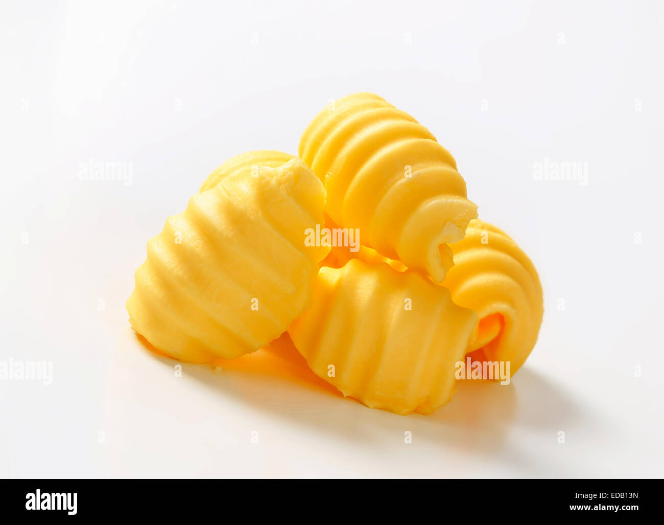 Studio shot of butter curls Stock Photo - Alamy