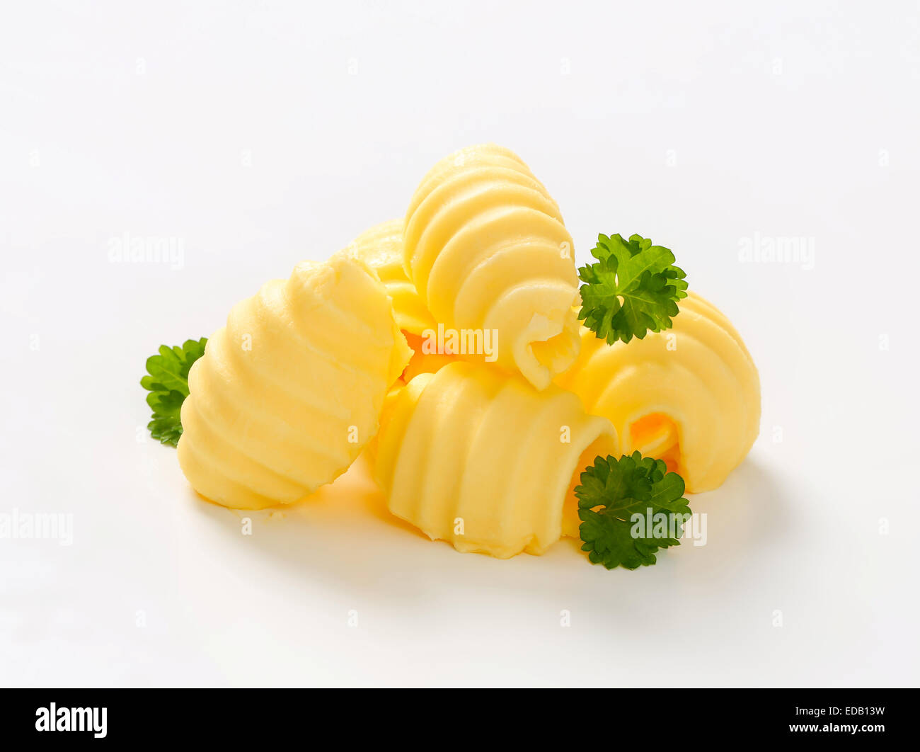 Studio shot of butter curls Stock Photo - Alamy
