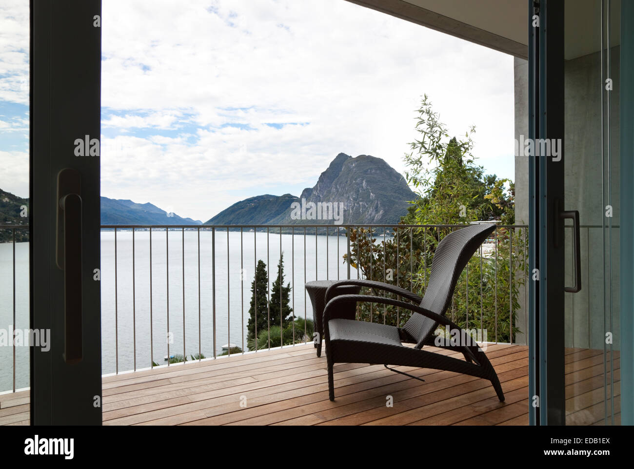 Wooden house windows balcony hi-res stock photography and images - Alamy